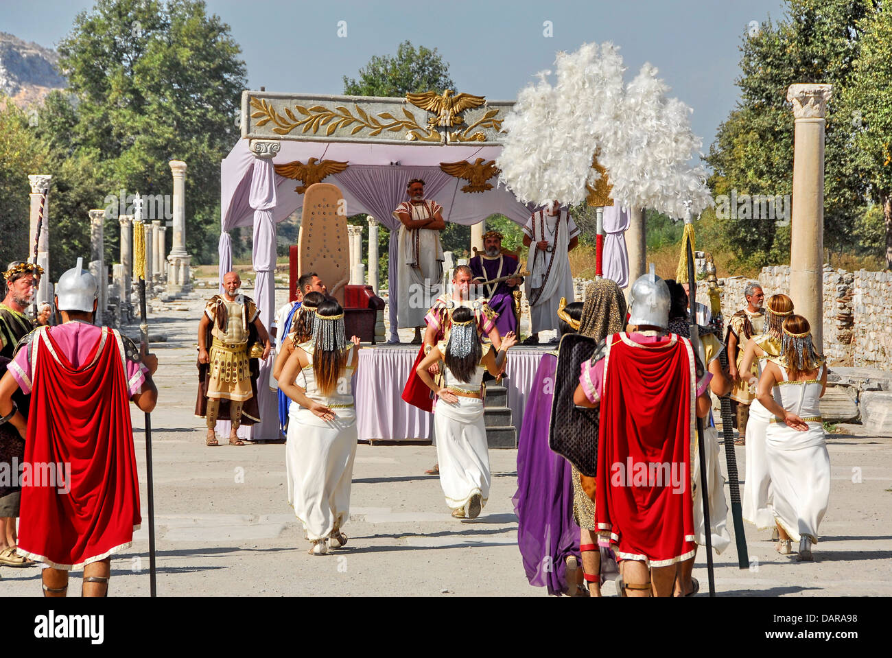 Actors recreating the Roman sport of gladiators in front of the Roman ...
