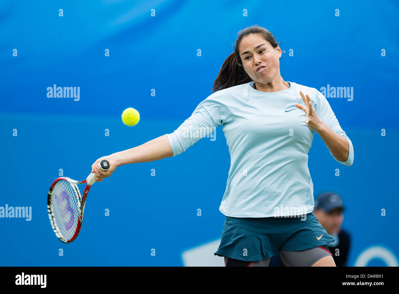 Jamie Hampton of USA in action playing single handed forehand shot ...