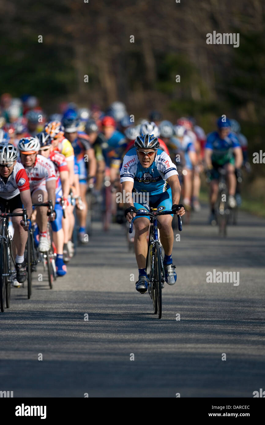 Caucasian racing bicyclists riding during hi-res stock photography and ...