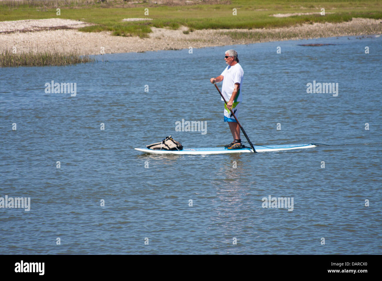 Paddle Boarding On The Ocean Stock Photo - Alamy