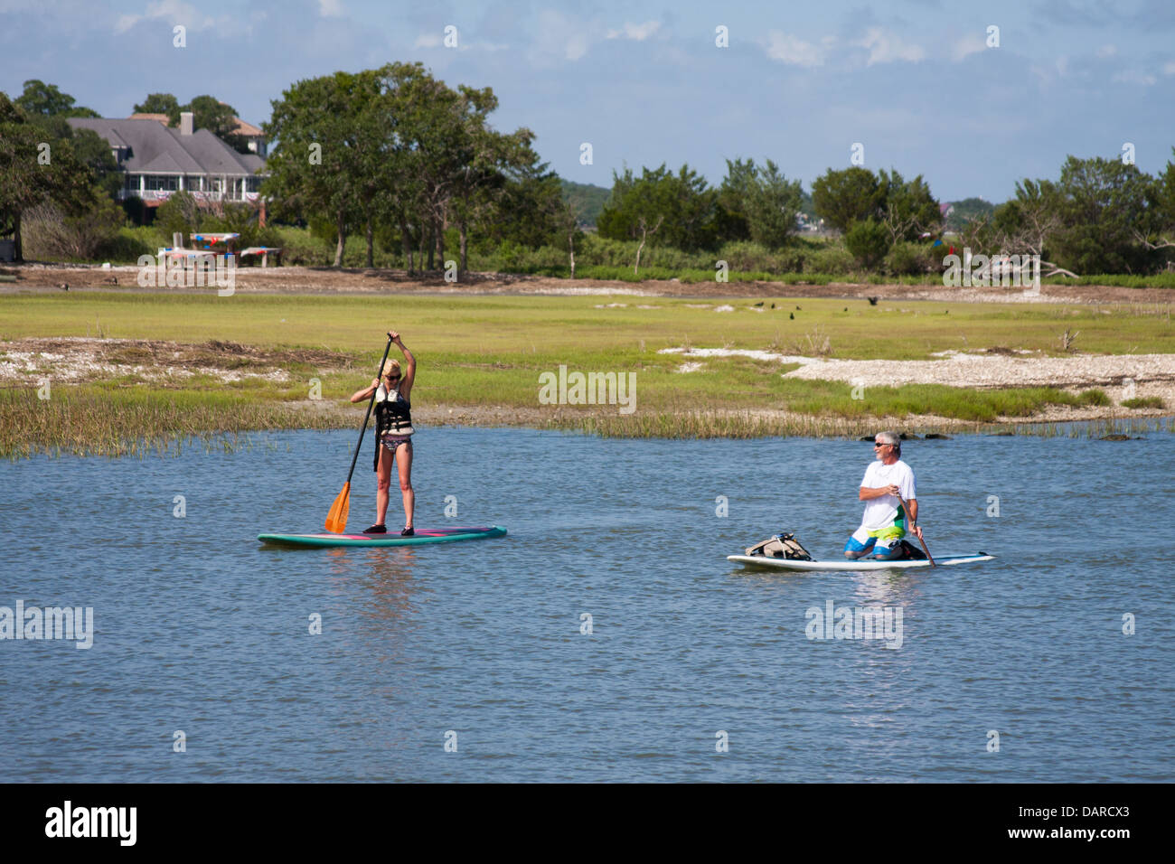 Paddle Boarding On The Ocean Stock Photo - Alamy