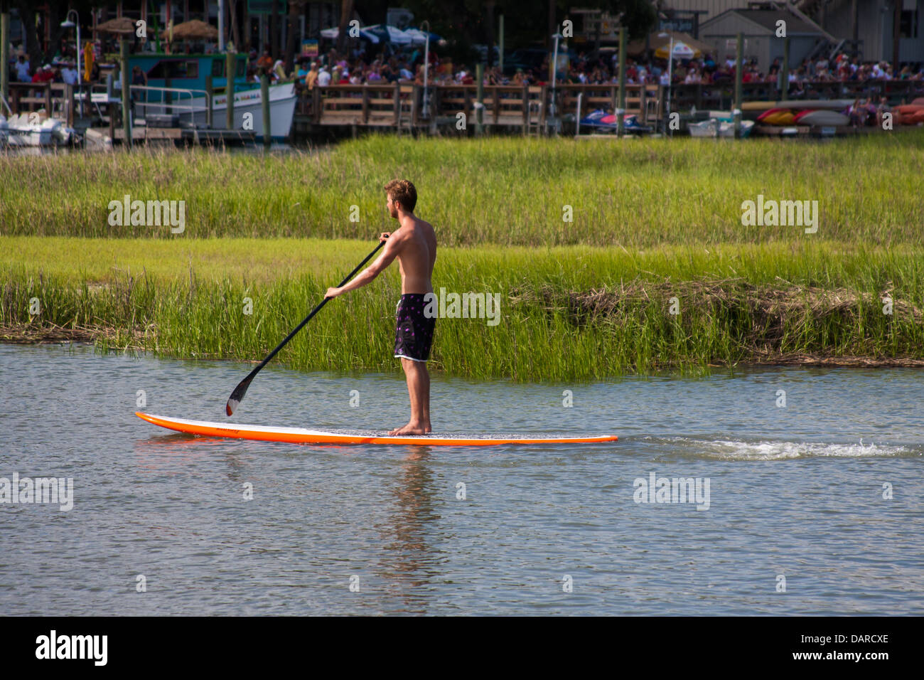 Paddle Boarding On The Ocean Stock Photo - Alamy