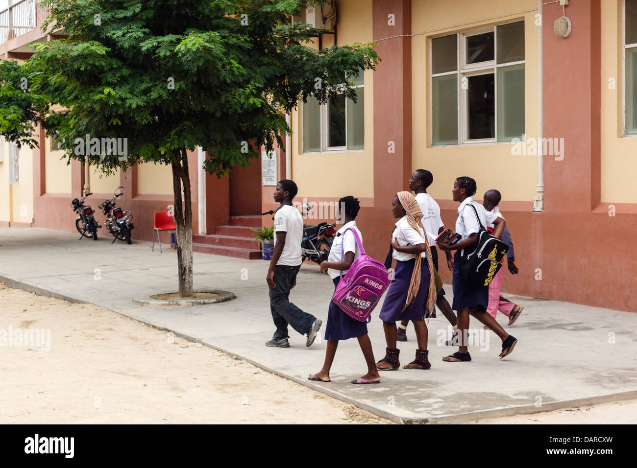 Africa, Mozambique, Mozambique Island. School children walking down ...