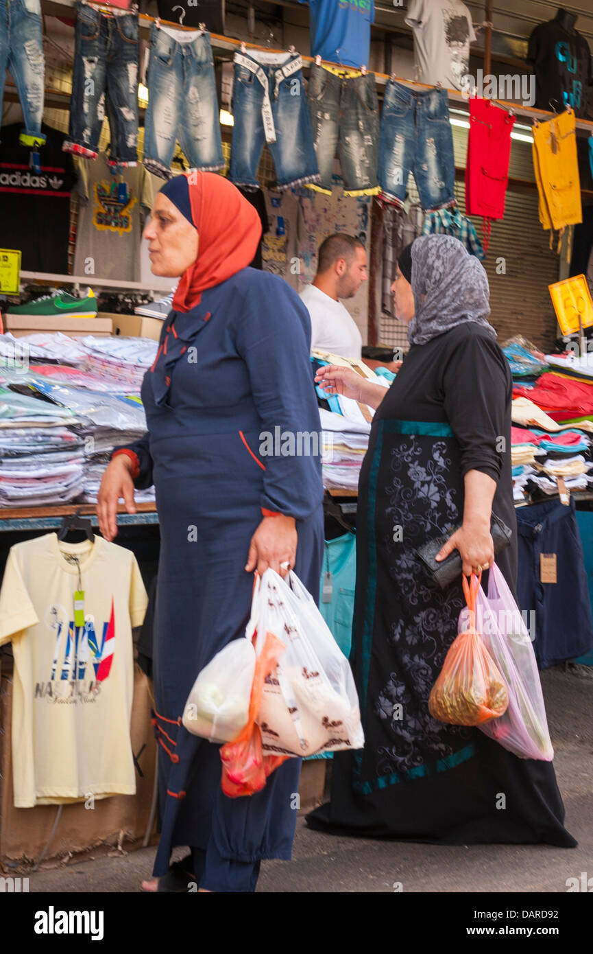Israel Tel Aviv Carmel Market childrens' clothes stall shop store Arab ...