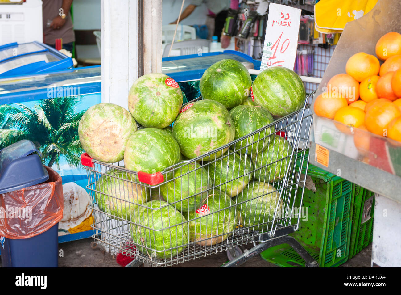 Israel Tel Aviv Carmel Market greengrocer supermarket trolley of water ...