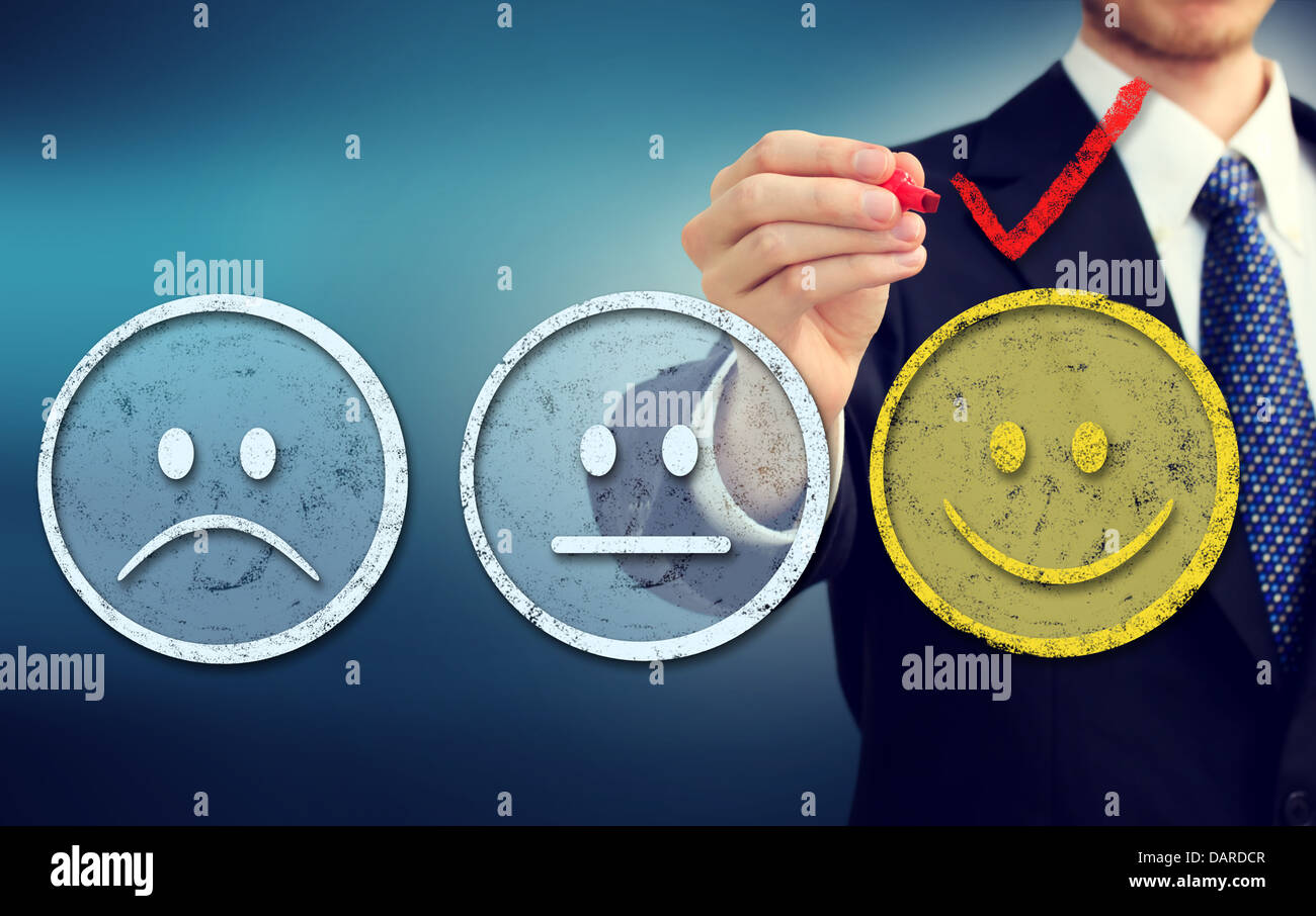 Business man drawing a check on smiley face Stock Photo - Alamy