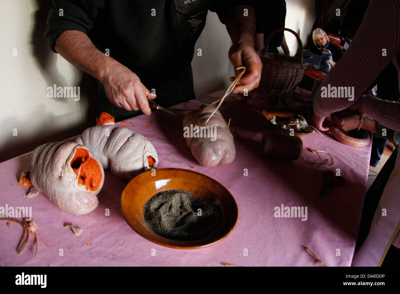 Different scenes from a traditional slaughter day in a village in the ...