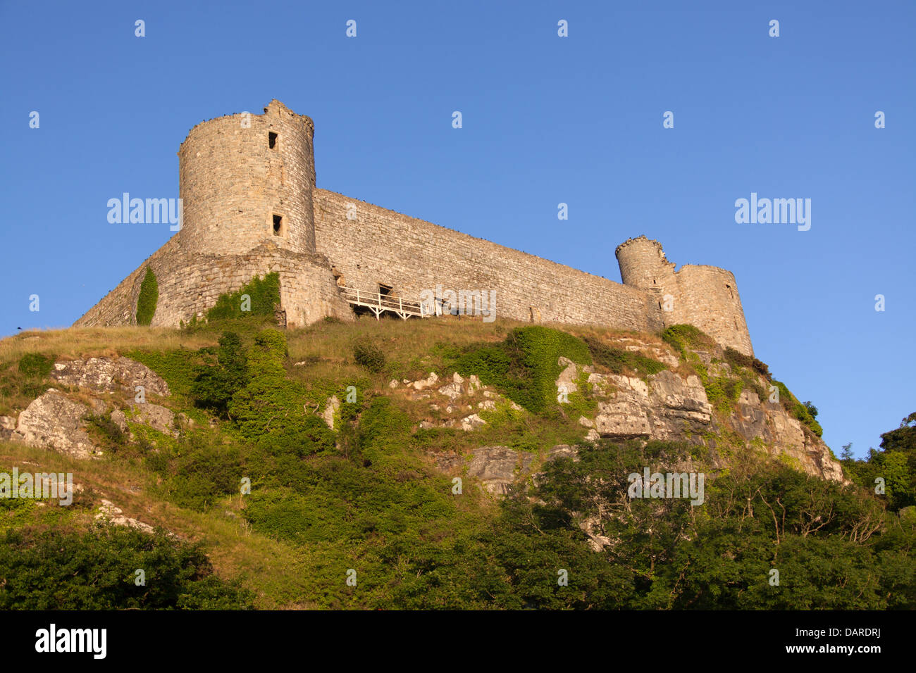 Town of Harlech, Wales. Summer evening view of Harlech Castle west ...