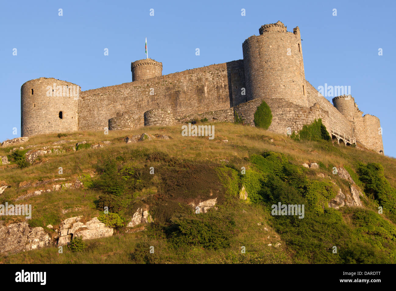 Town of Harlech, Wales. Summer evening view of the north and west walls ...