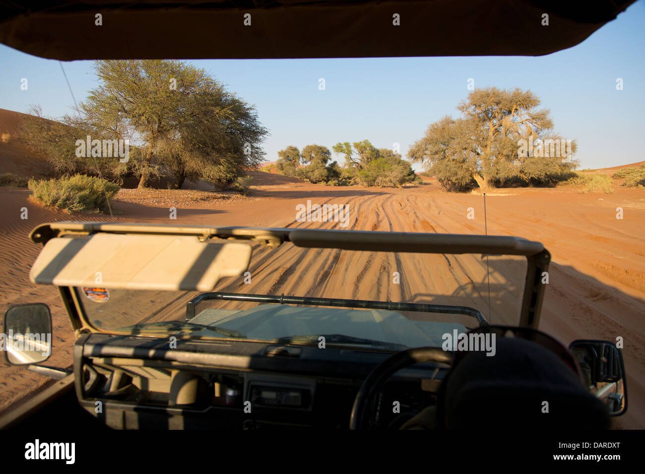 Driving in to Sossusvlei by 4x4 Park shuttle, Namibia Stock Photo - Alamy