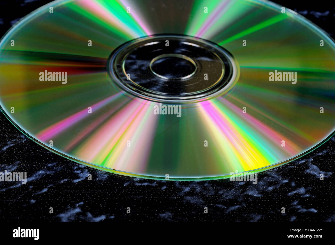 CD/DVD against black background against a dark background Stock Photo ...