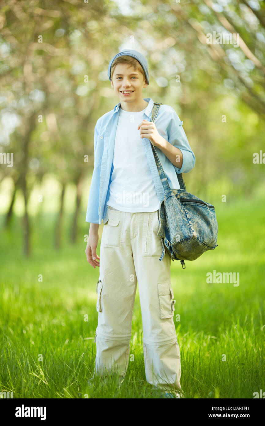 Portrait of cute lad in casual clothes looking at camera outside Stock ...