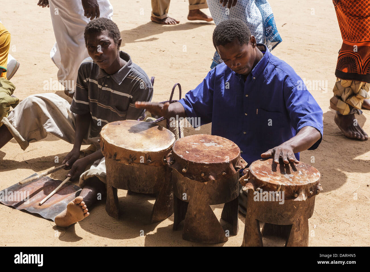 Africa, Tanzania, Zanzibar, Pemba Island. Men drumming for traditional ...