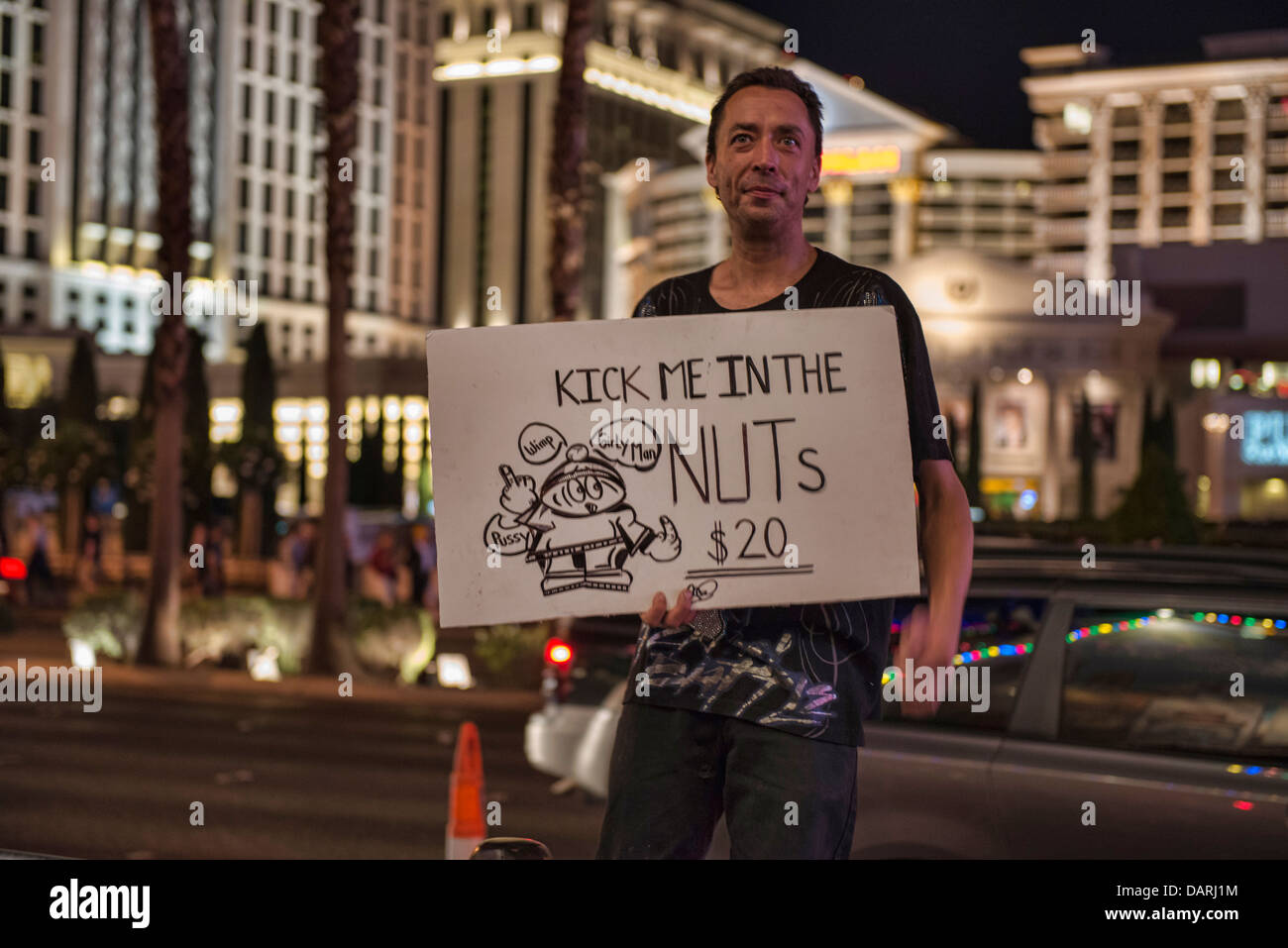 I'll do anything for work. Sign along the Strip in Las Vegas, Nevada ...