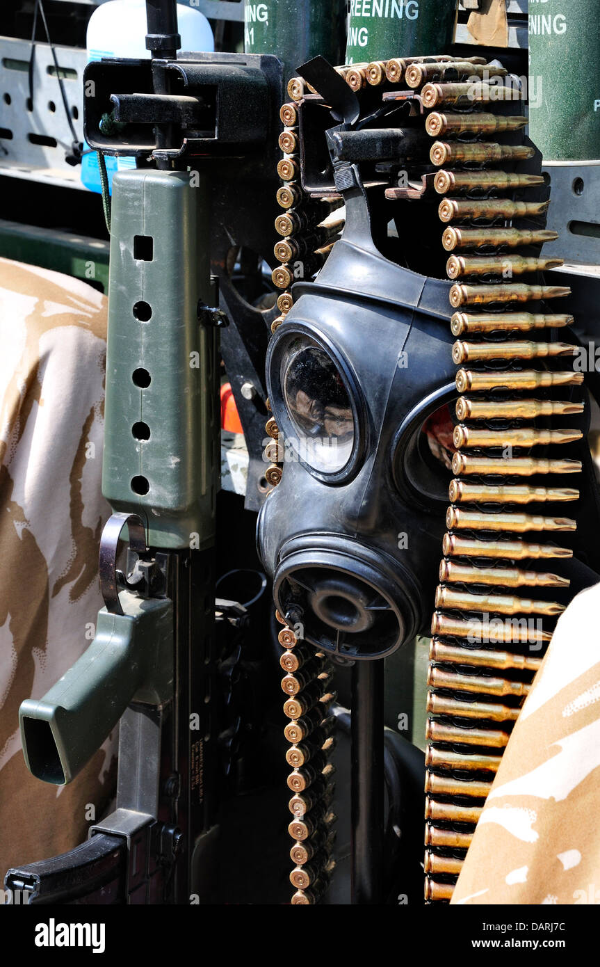 Machine gun bullet belt and gas mask hanging in an armoured vehicle ...