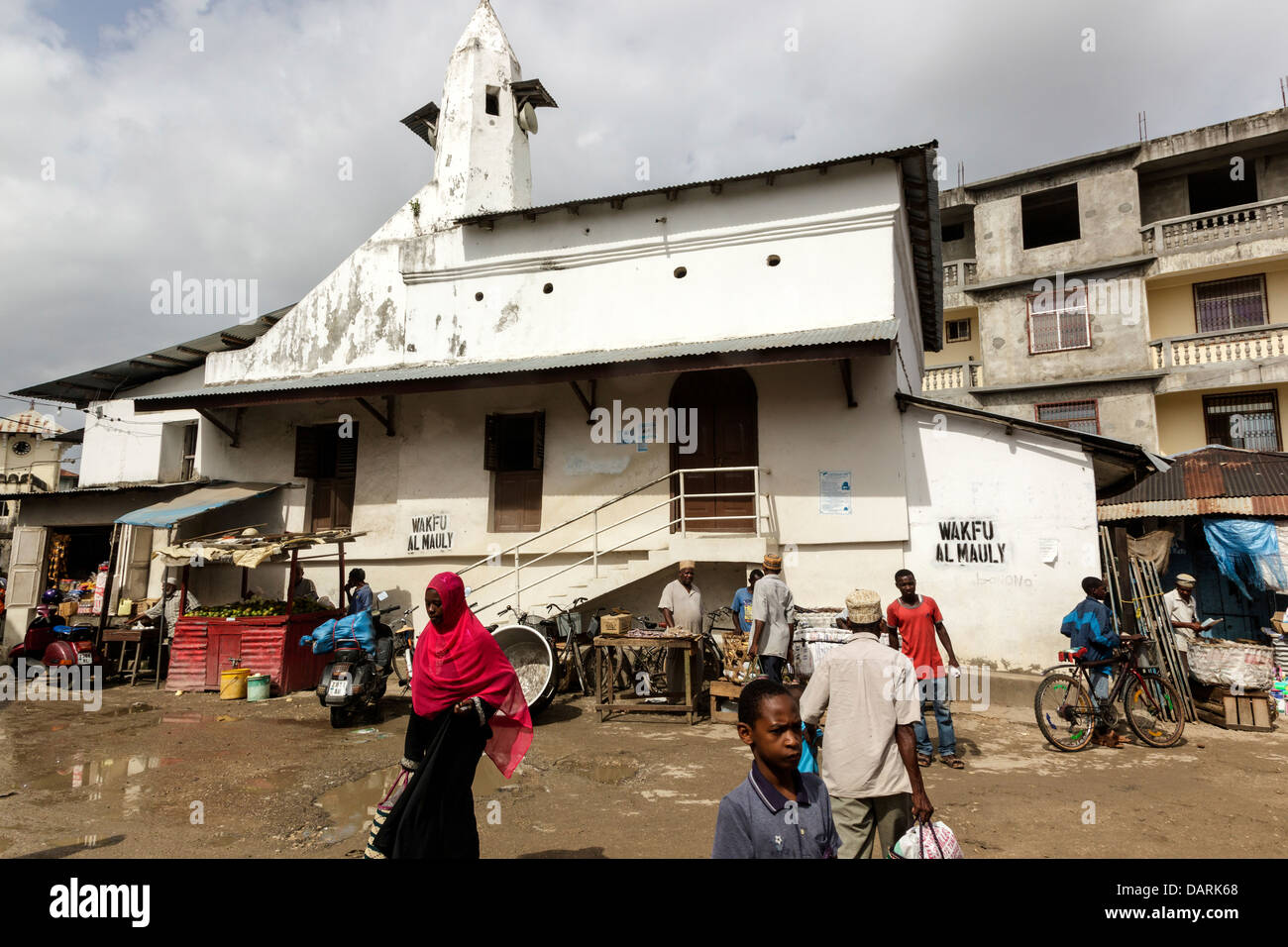 Africa, Tanzania, Zanzibar, Pemba Island, Chake Chake. People walking ...