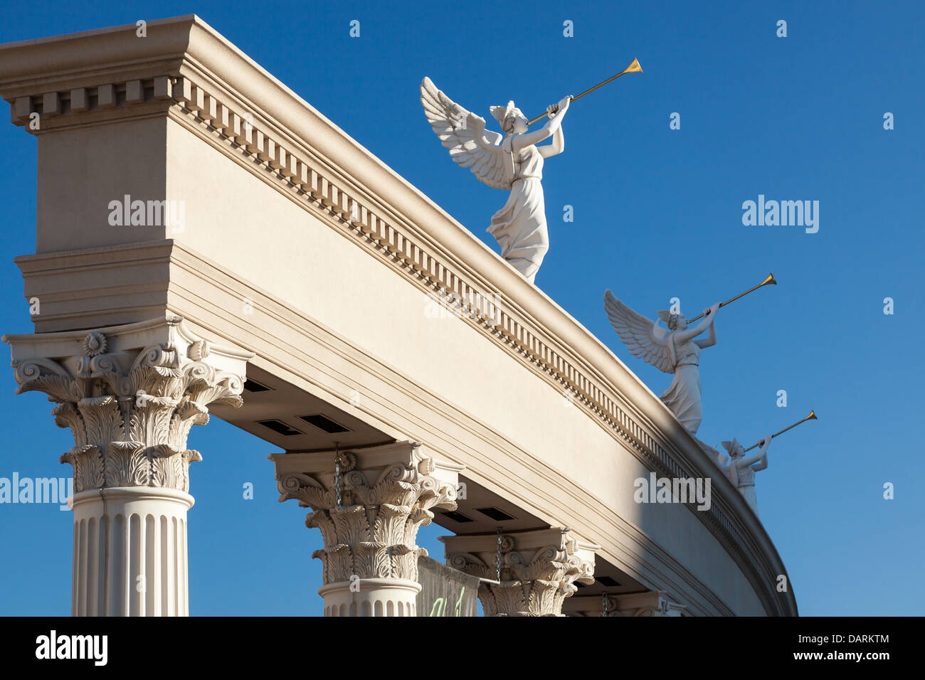 Angels playing golden bugles Stock Photo - Alamy