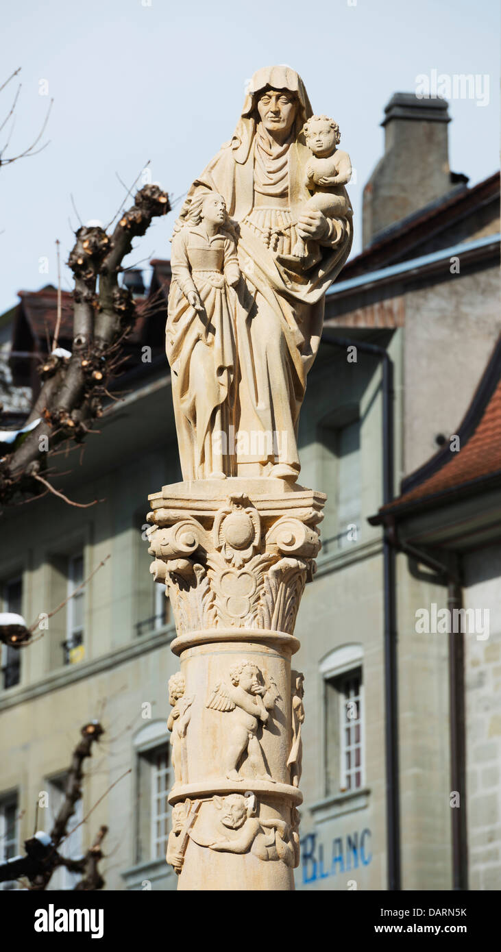 Europe, Switzerland, Fribourg, statue outside the 13th century Gothic ...