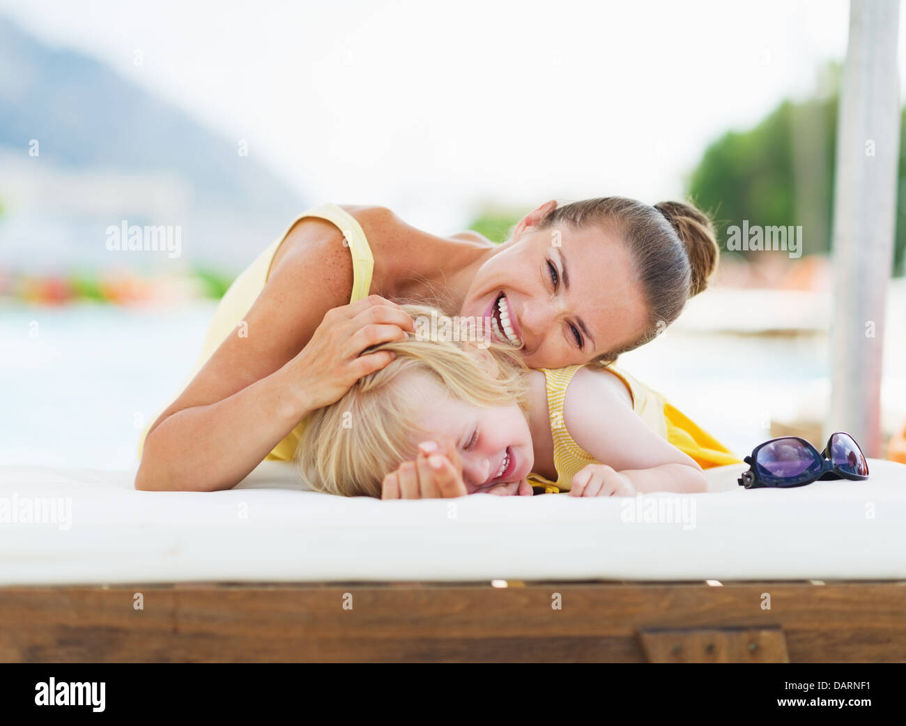 Pretty mother baby swimming pool hi-res stock photography and images - Alamy