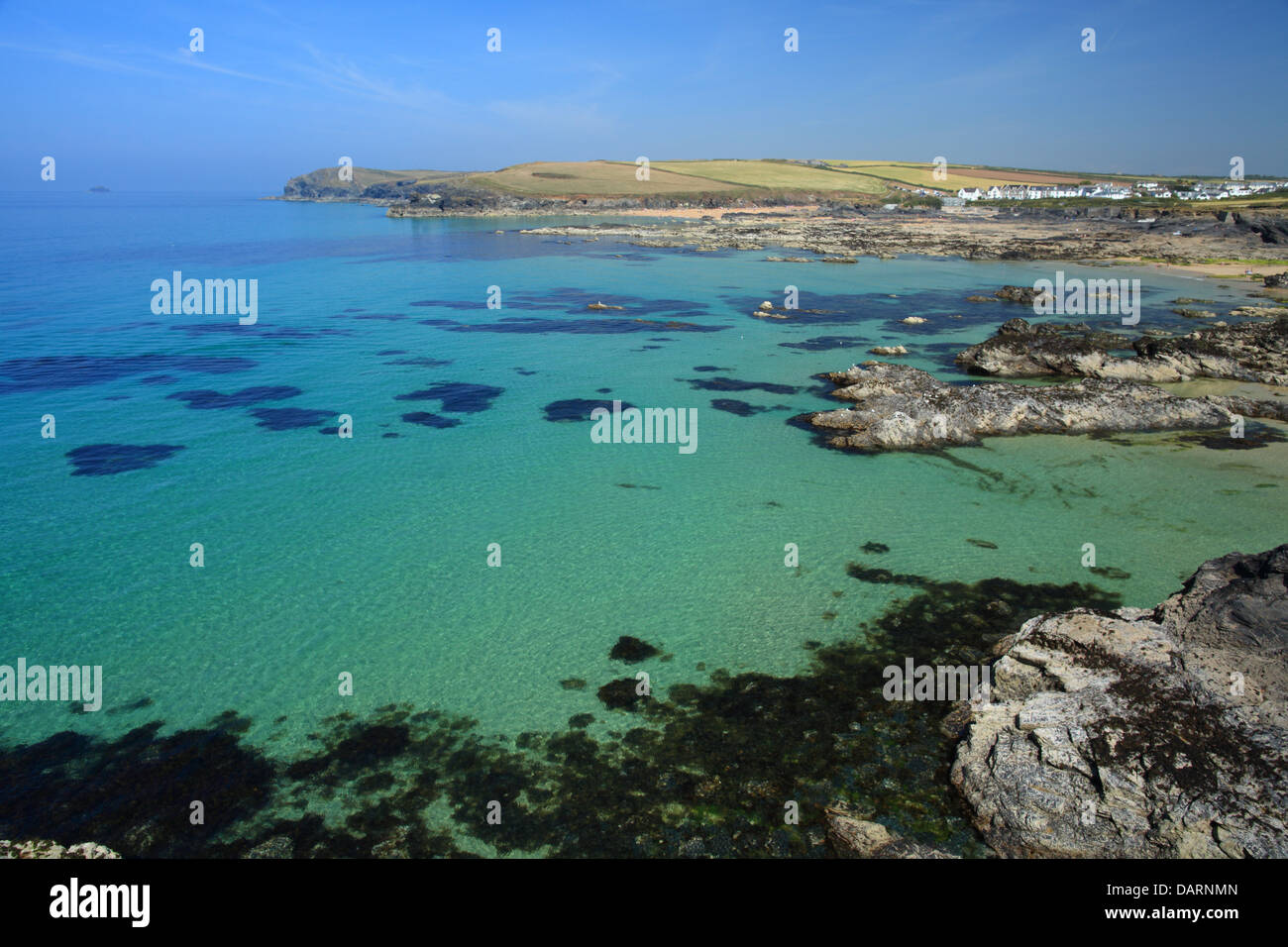 Flat calm sea, view across Newtrain Bay towards Trevone Bay, North ...