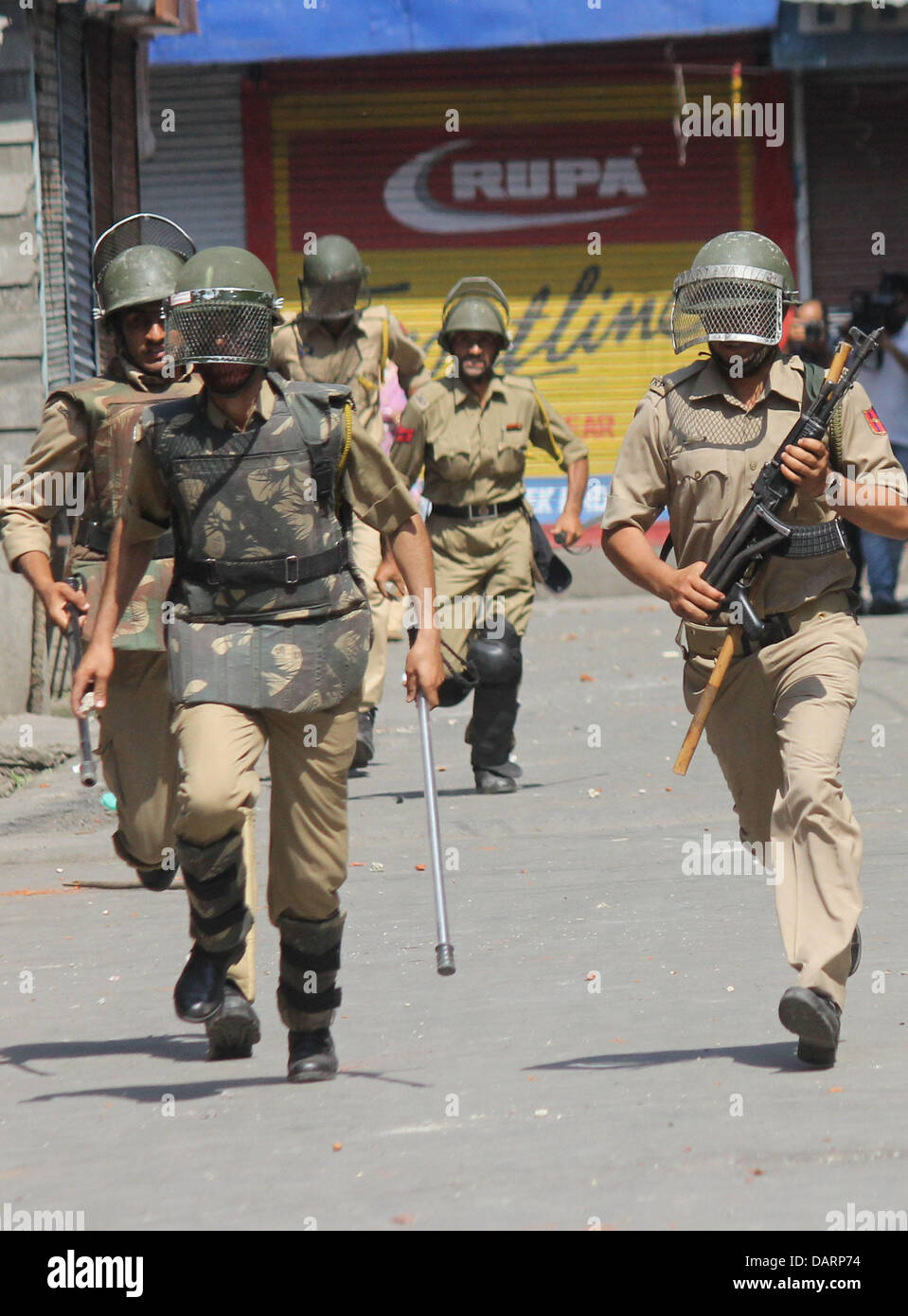 India police beating hi-res stock photography and images - Alamy