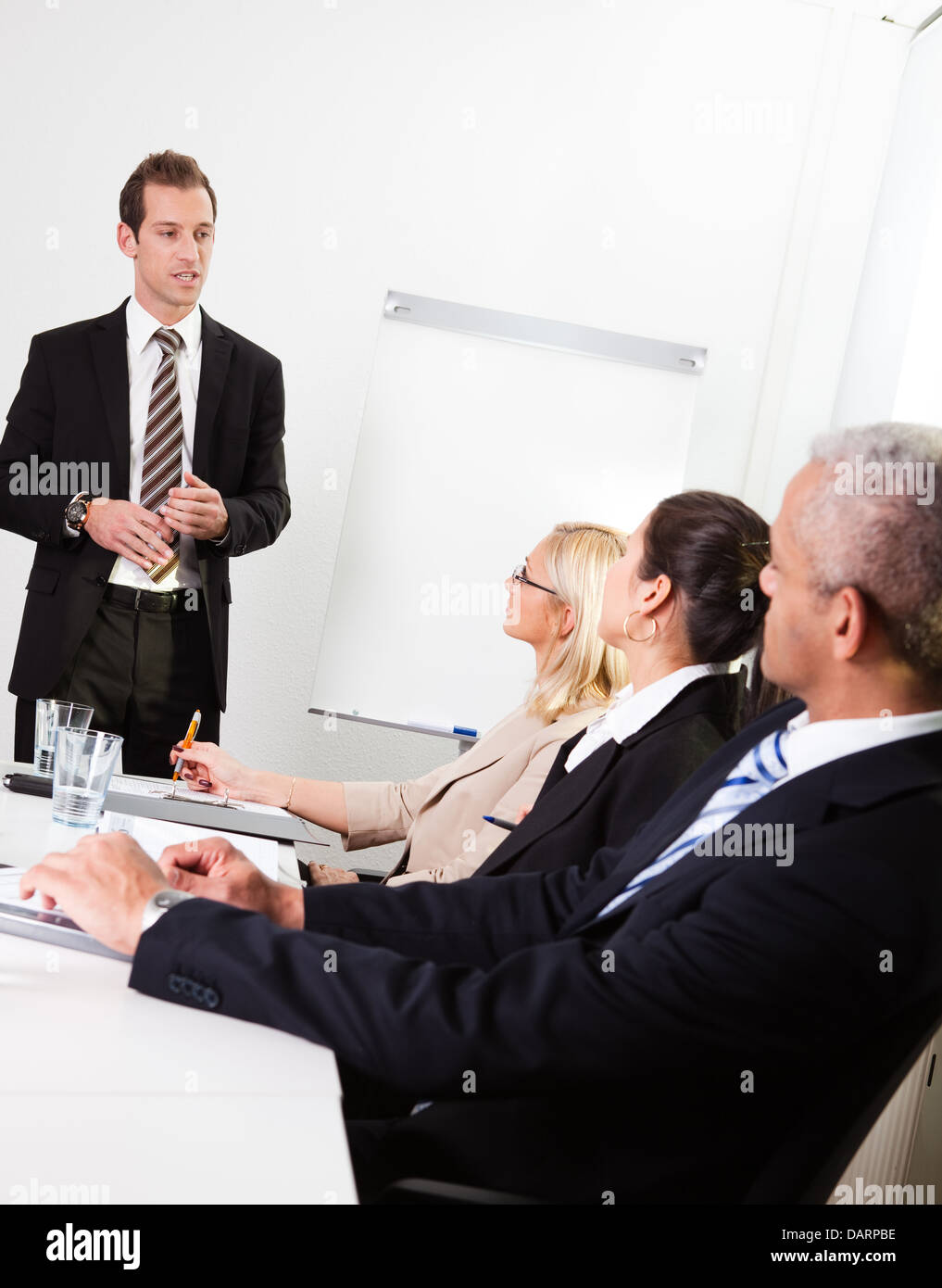 Businessman giving a presentation Stock Photo - Alamy