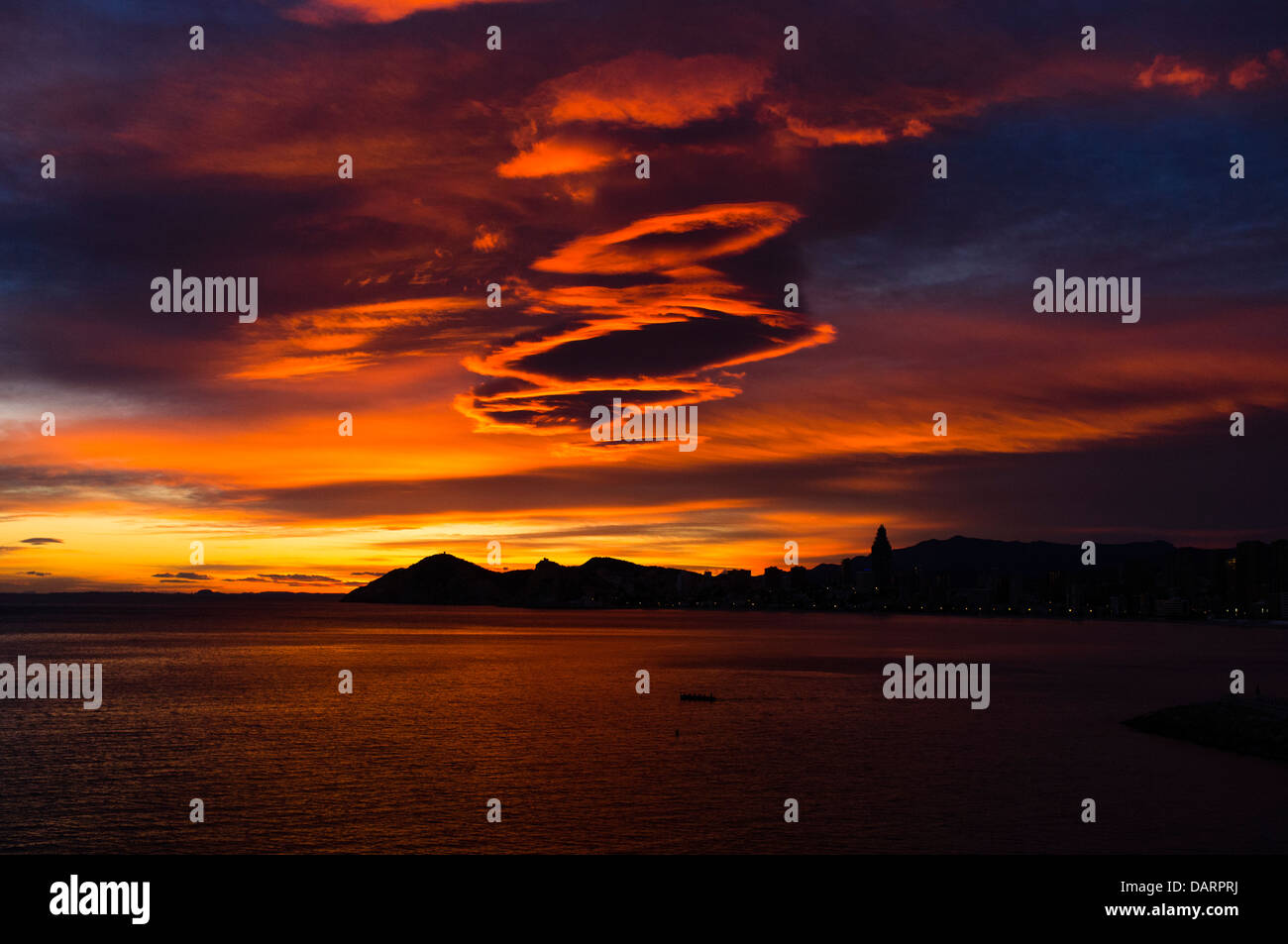 Lenticular cloud formation during a sunset in Benidorm Stock Photo - Alamy