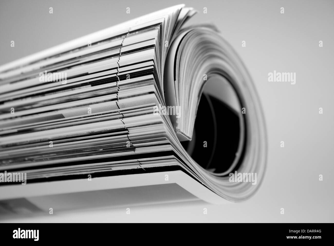 rolled up magazine Stock Photo - Alamy