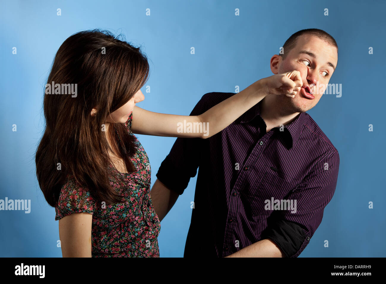 Women punching men Stock Photo - Alamy