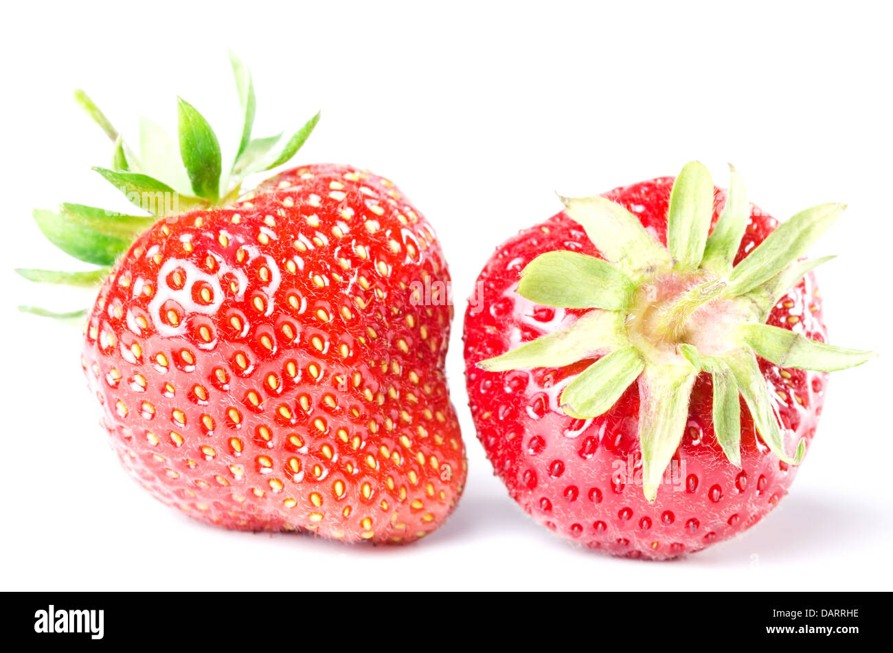 two red strawberries isolated before white background Stock Photo - Alamy