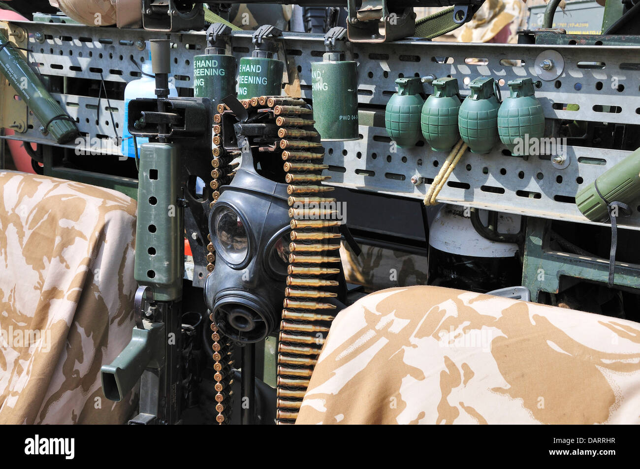 Machine gun bullet belt and gas mask hanging in an armoured vehicle ...