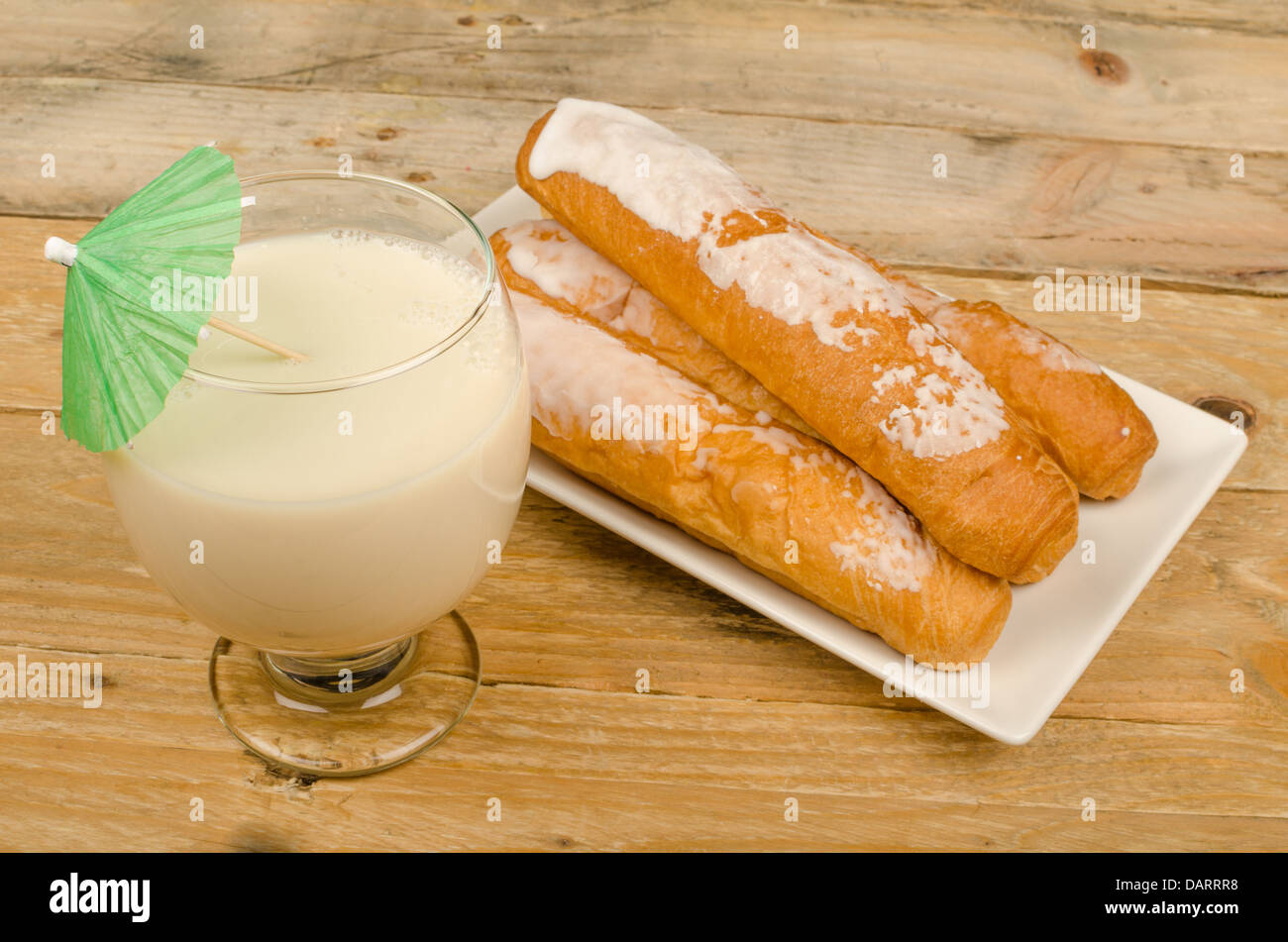 Horchata and fartons, a traditional Spanish snack eaten in summer Stock ...
