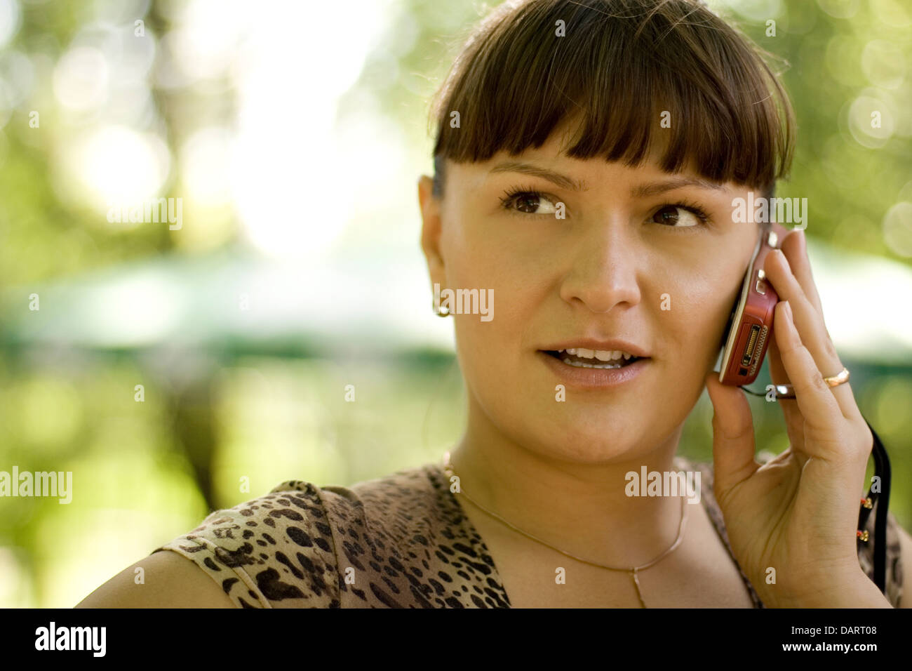 beautiful woman calling by phone Stock Photo - Alamy