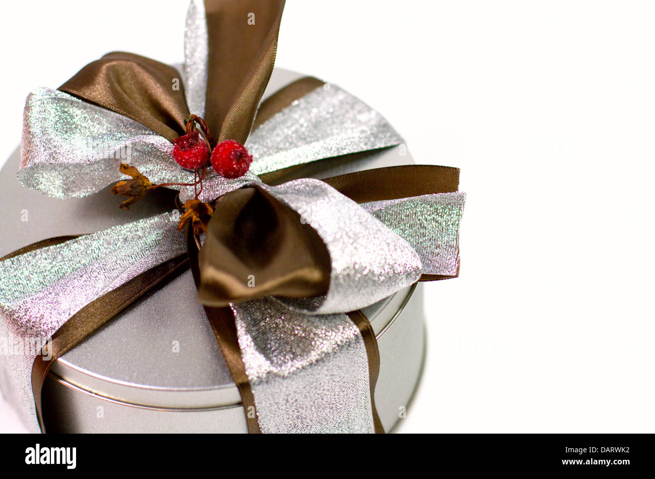metal gift box with beautiful bow Stock Photo - Alamy