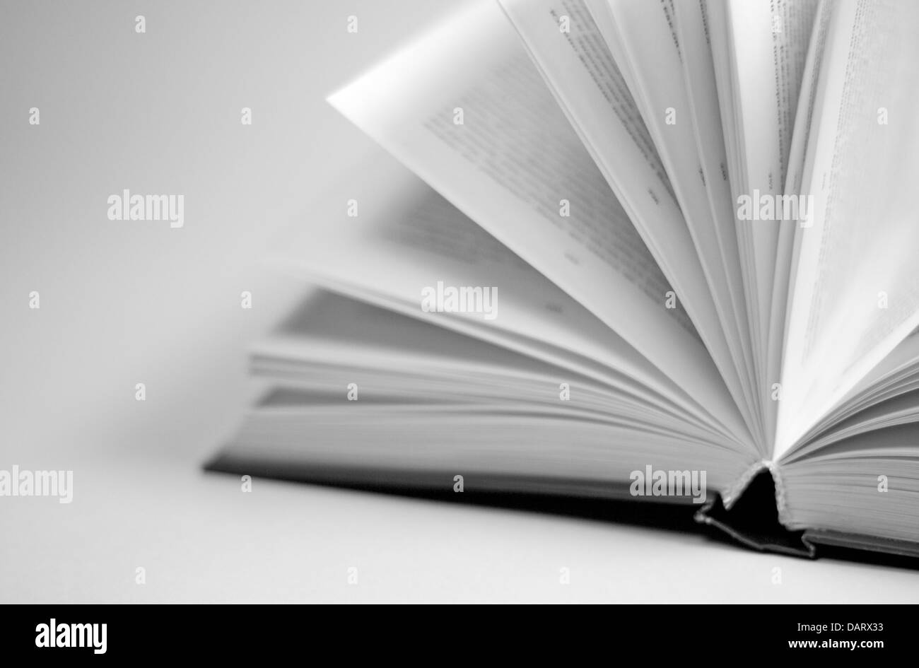 Open book white background white pages Black and White Stock Photos ...
