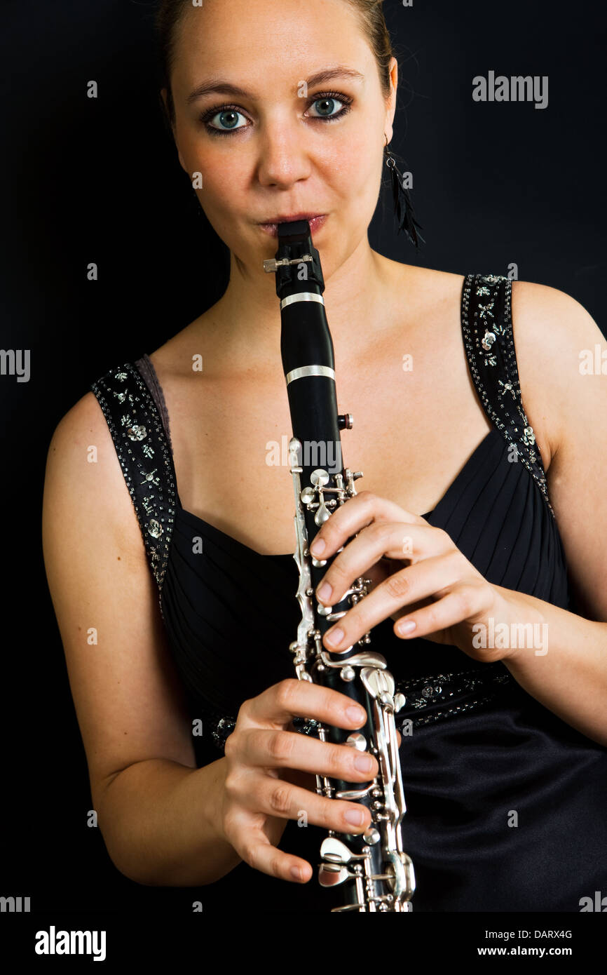 Young beautiful clarinetist Stock Photo - Alamy