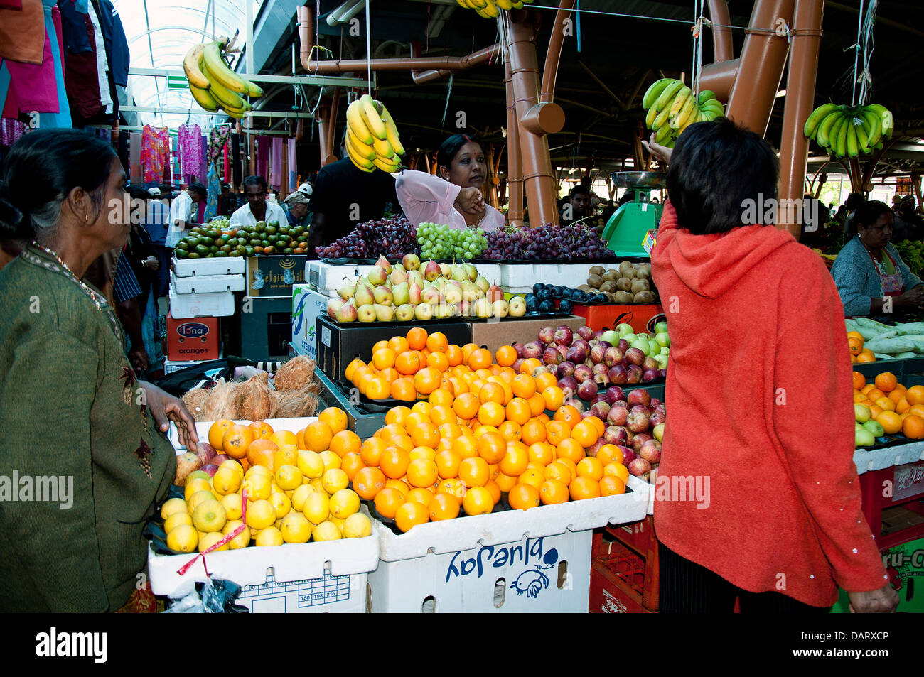 FLACQ, MAURITIUS-JUNE 23: Customers buys fruit and vegetable in the ...