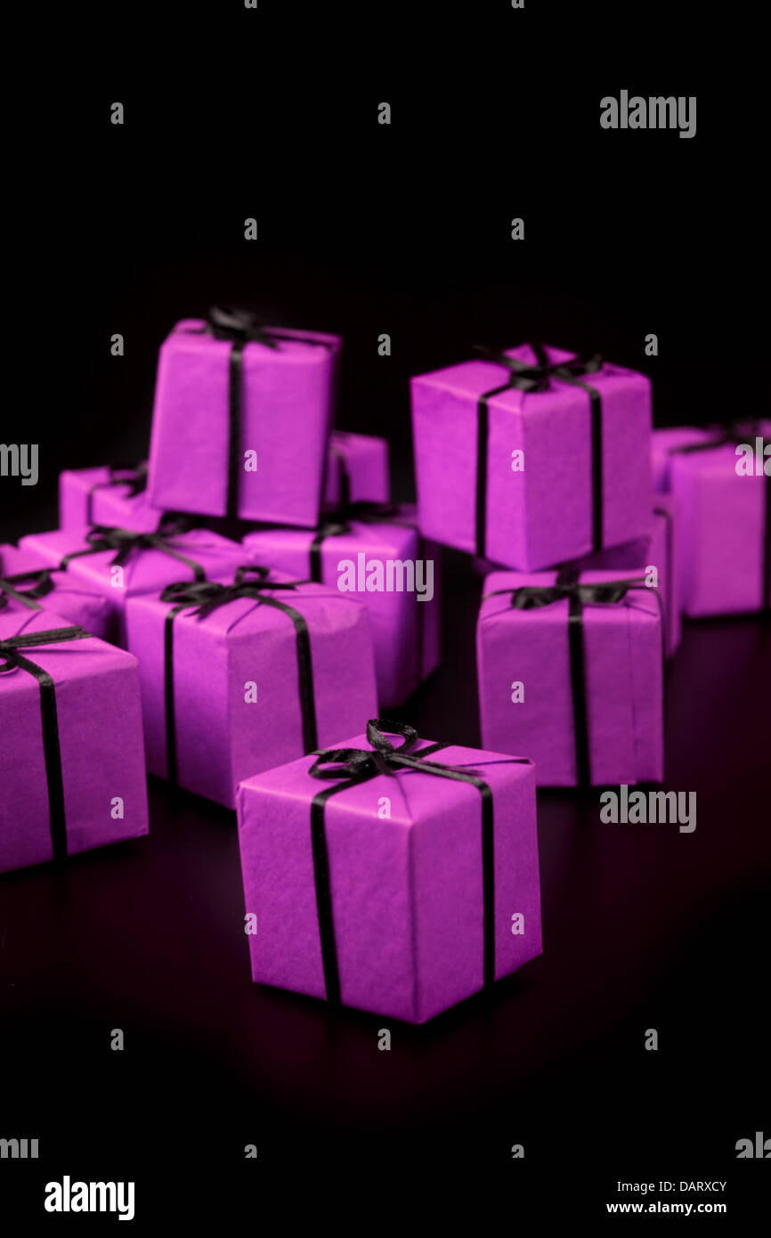 many violet gift boxes Stock Photo - Alamy