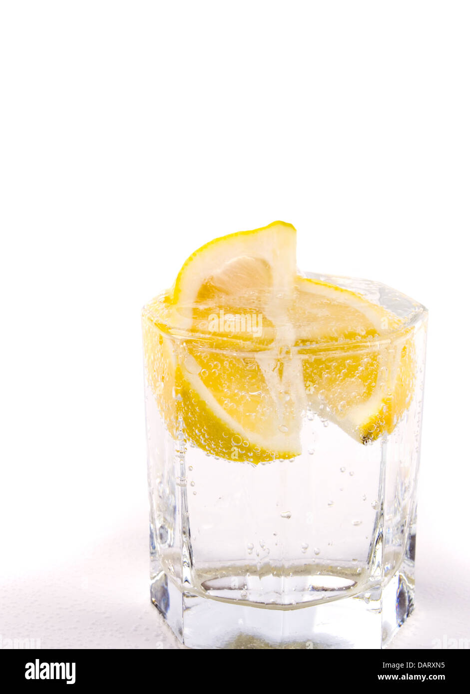 glass with soda water and lemon Stock Photo - Alamy