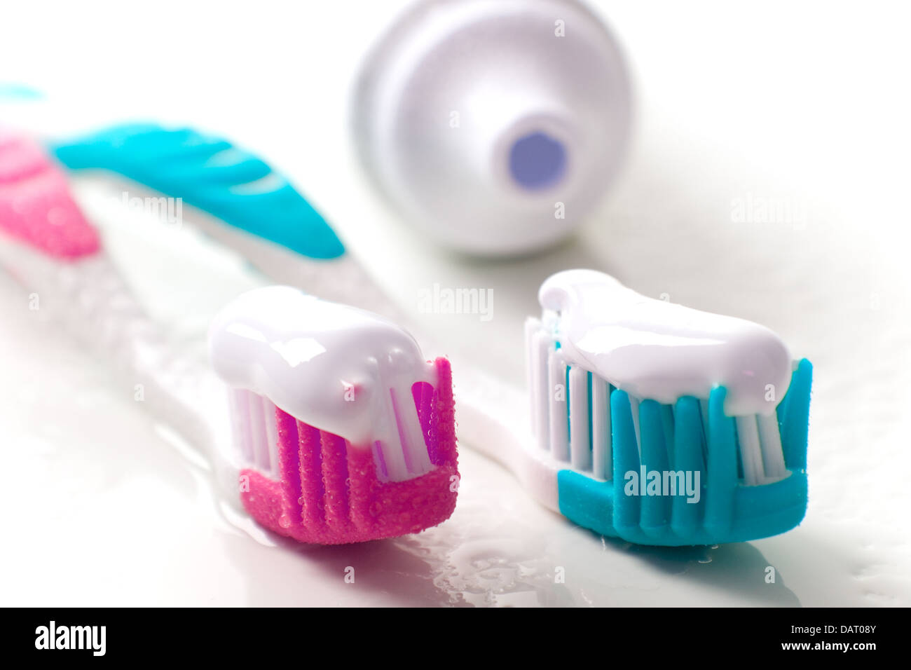 toothpaste and toothbrushes Stock Photo - Alamy