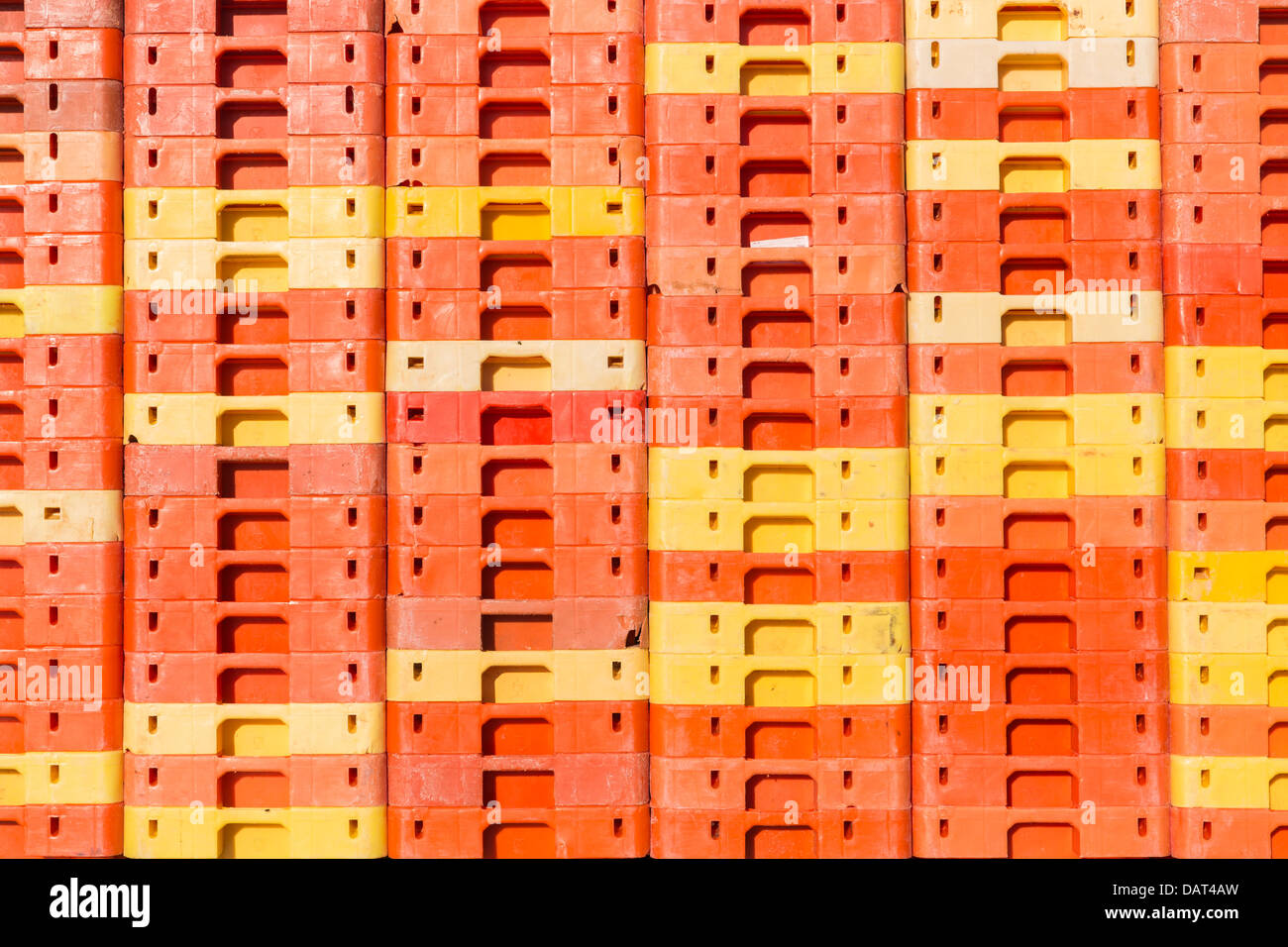Colorful background of piled plastic crates Stock Photo - Alamy