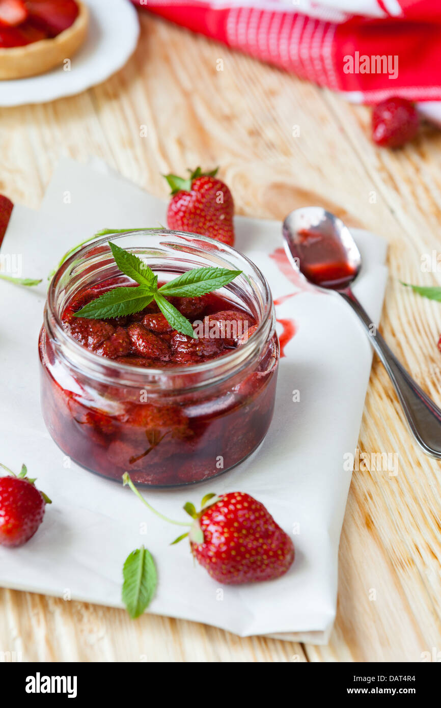 strawberry jam in a jar with mint, food close up Stock Photo - Alamy
