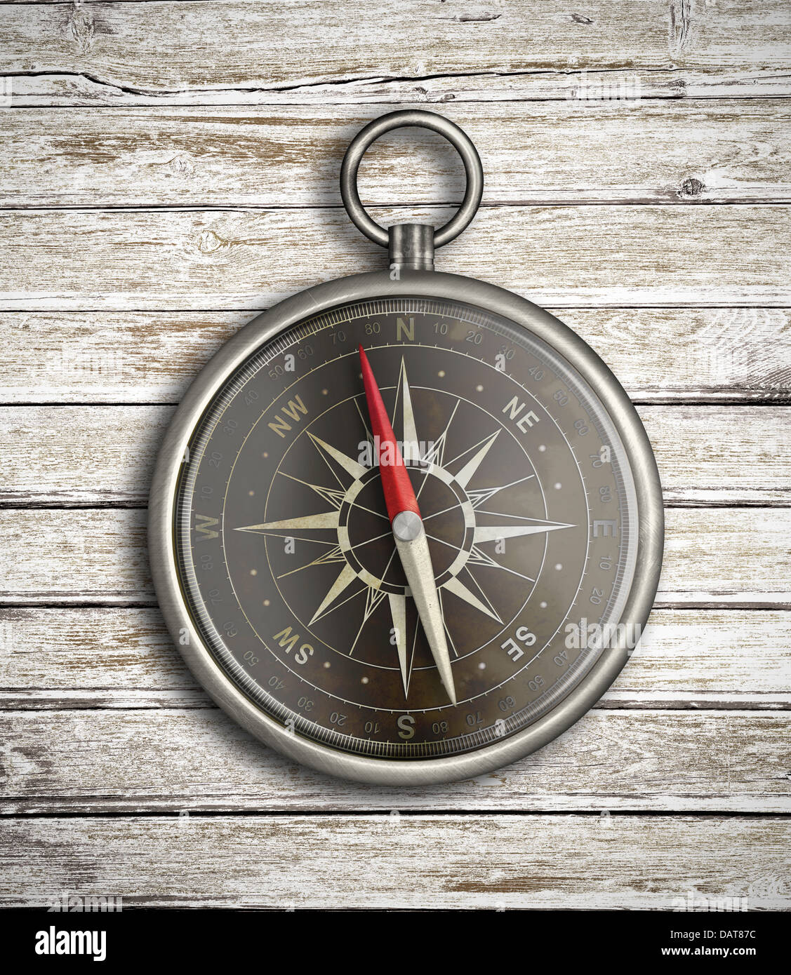 Vintage compass over wood background Stock Photo - Alamy