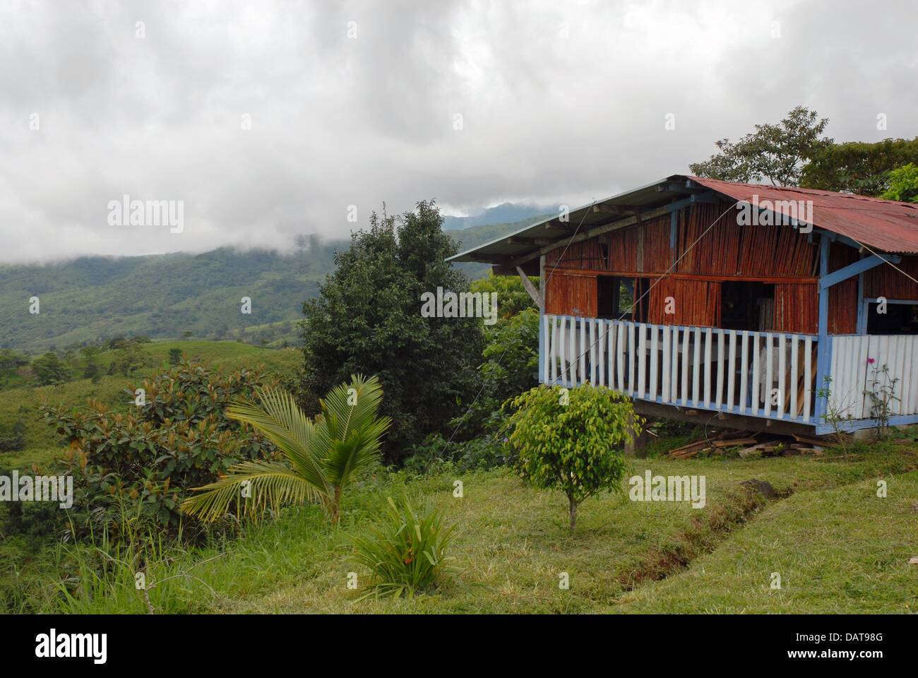 Wooden house in a valley Stock Photo - Alamy