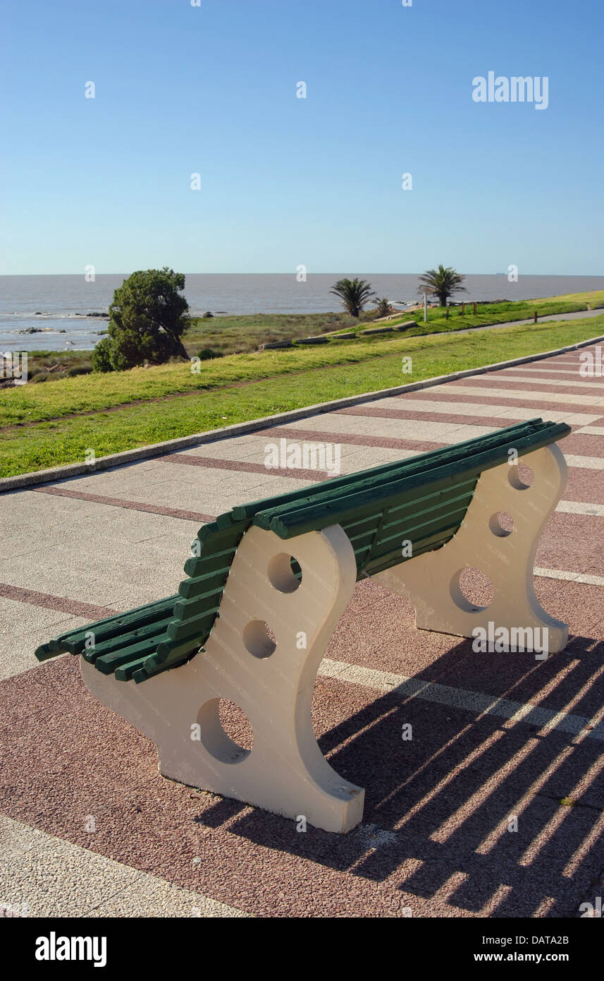 Bench facing the beach Stock Photo - Alamy