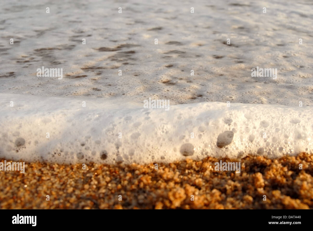 Wave foam closeup Stock Photo - Alamy