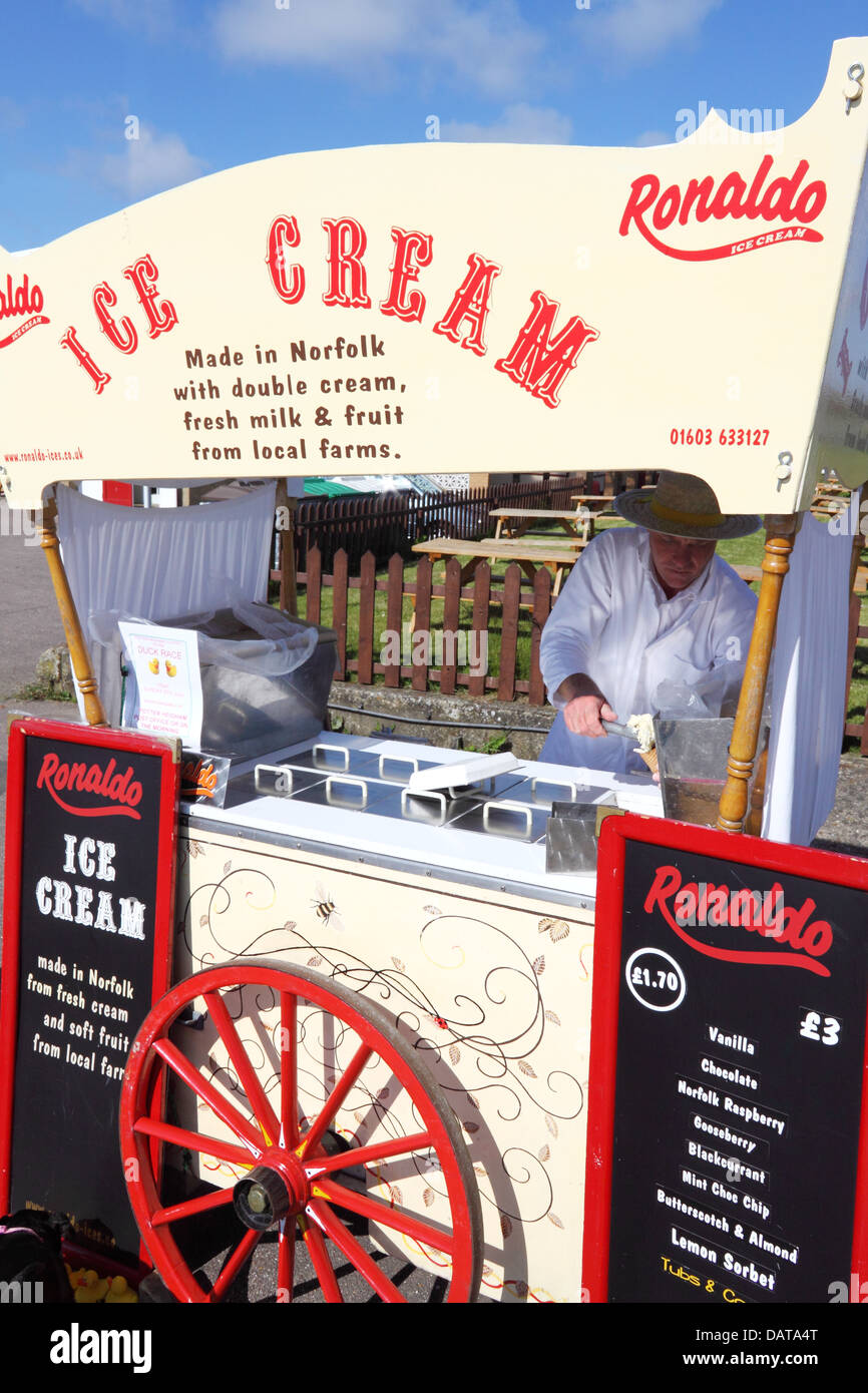 Norfolk ice cream cart and vendor in Potter Heigham, Norfolk, England ...