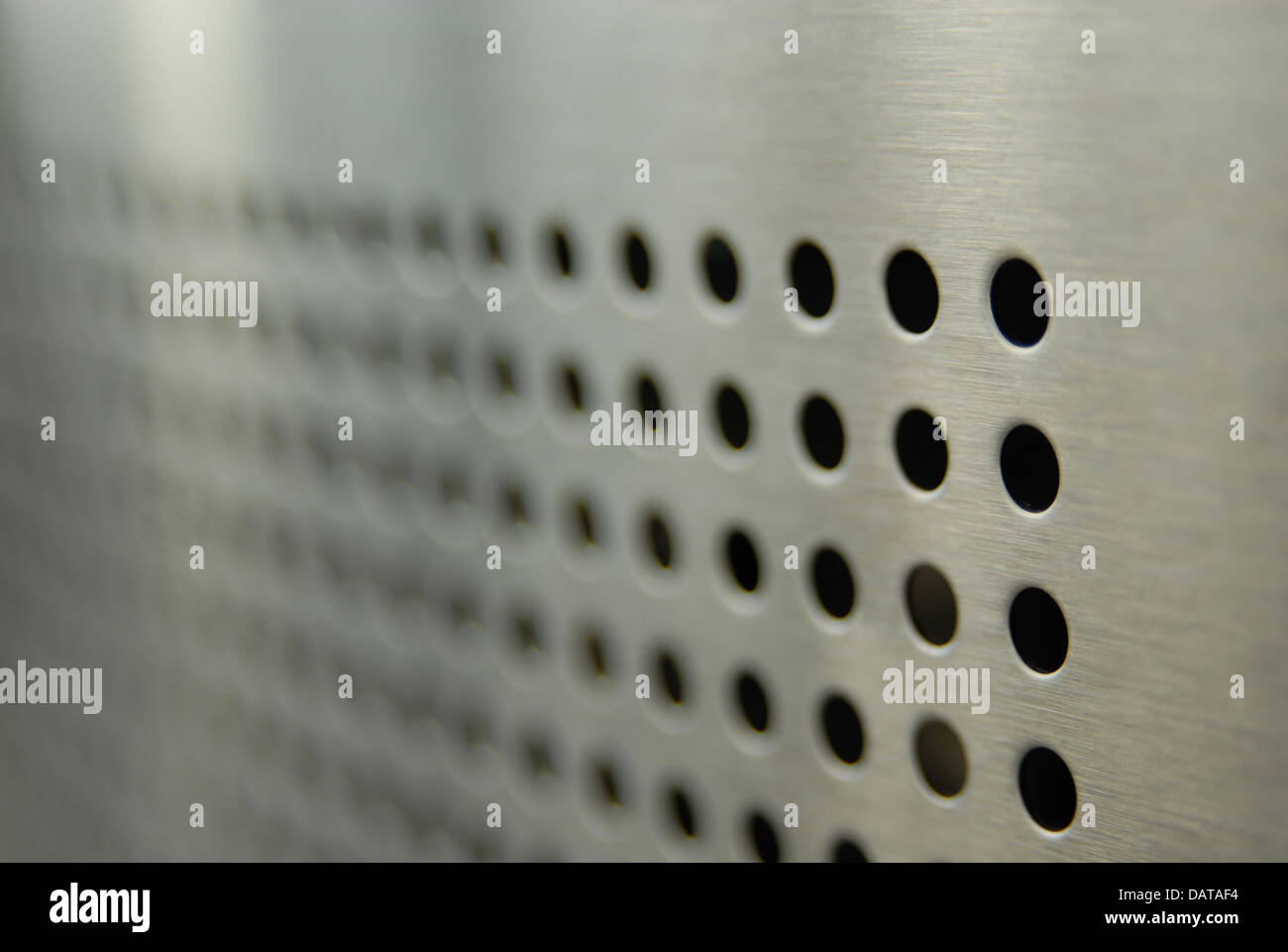 Holes in metal Stock Photo - Alamy