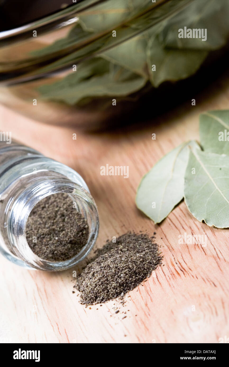 black pepper in shaker and bay leaves Stock Photo - Alamy