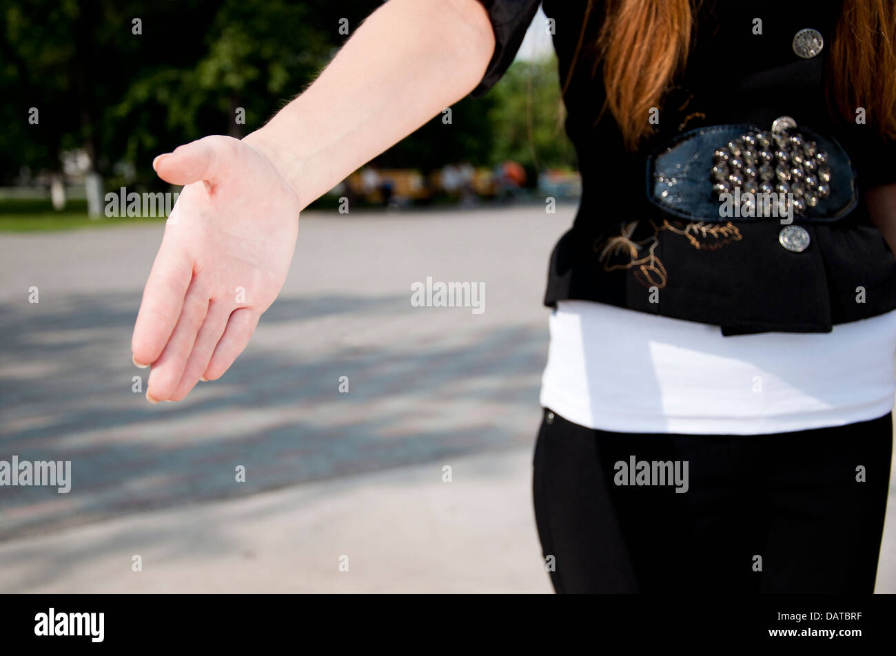 girl stretches a hand for hand shake Stock Photo - Alamy